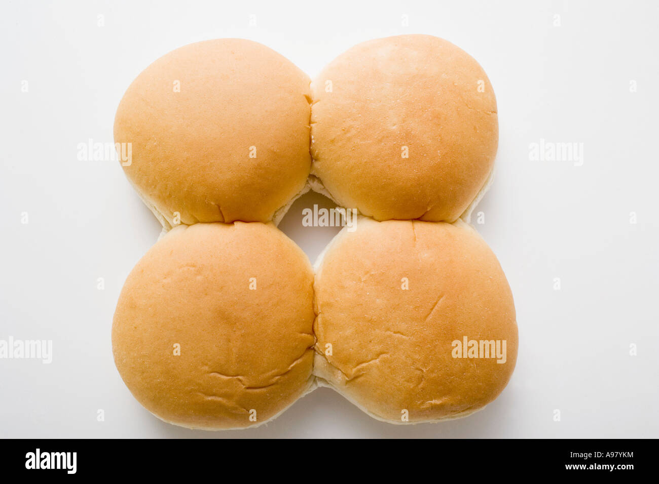 Four hamburger buns FoodCollection Stock Photo - Alamy