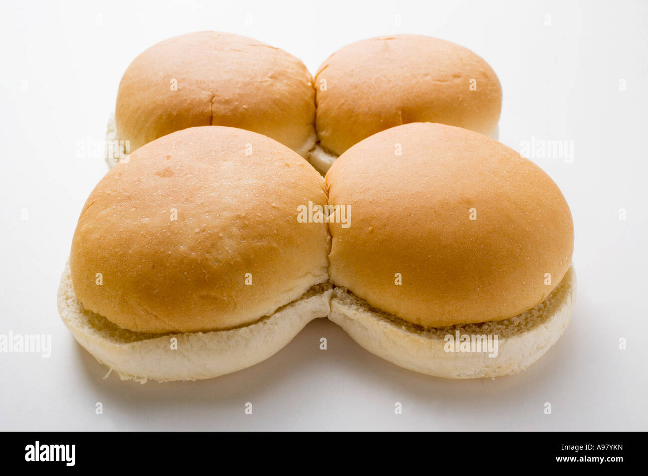 Four hamburger buns split FoodCollection Stock Photo - Alamy