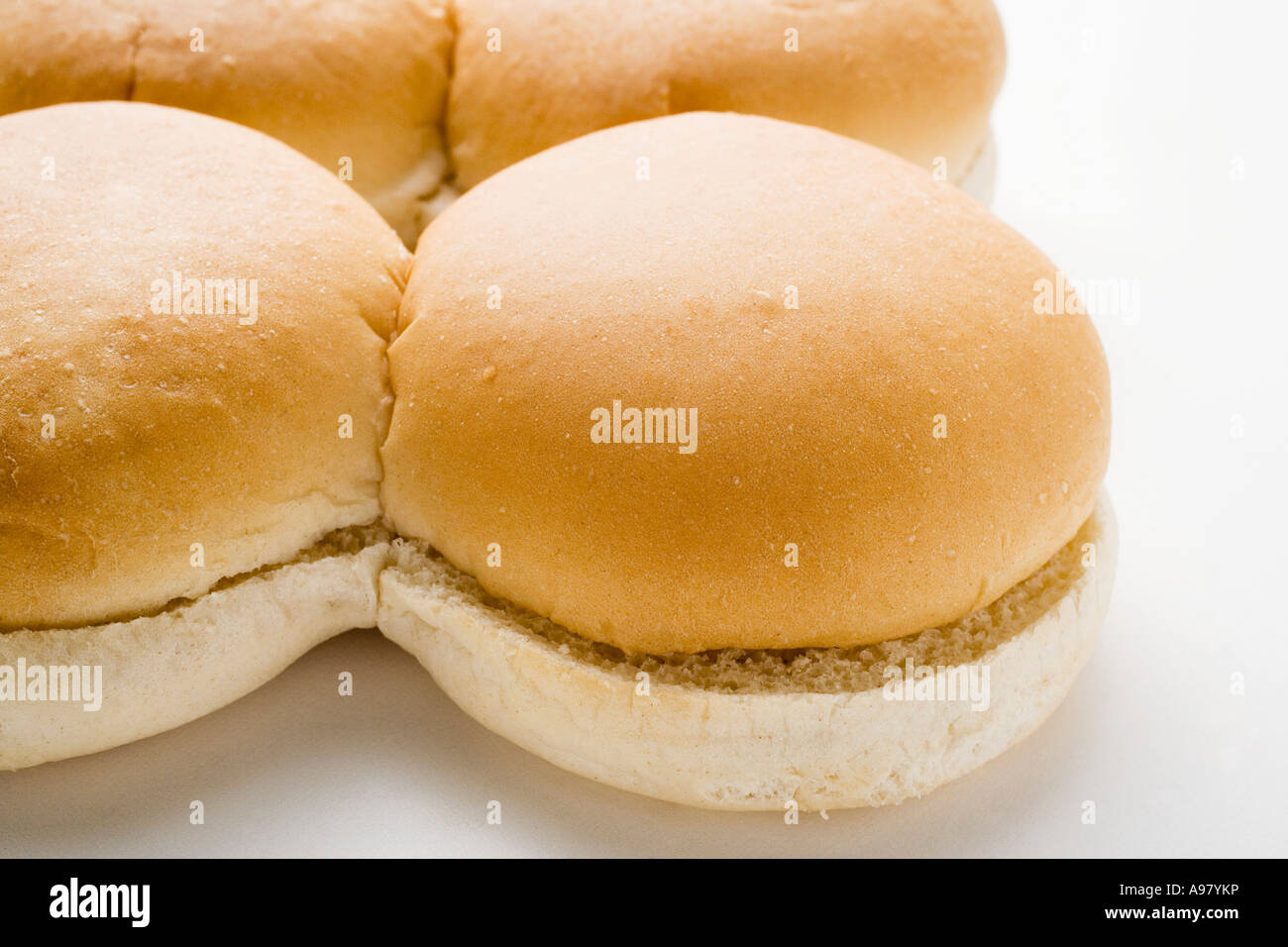 Four hamburger buns split FoodCollection Stock Photo - Alamy