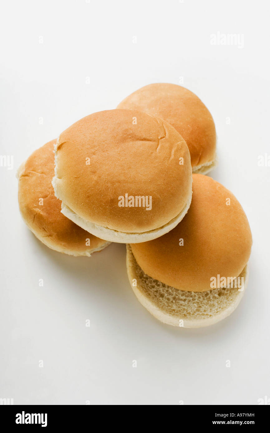 Four hamburger buns split FoodCollection Stock Photo - Alamy