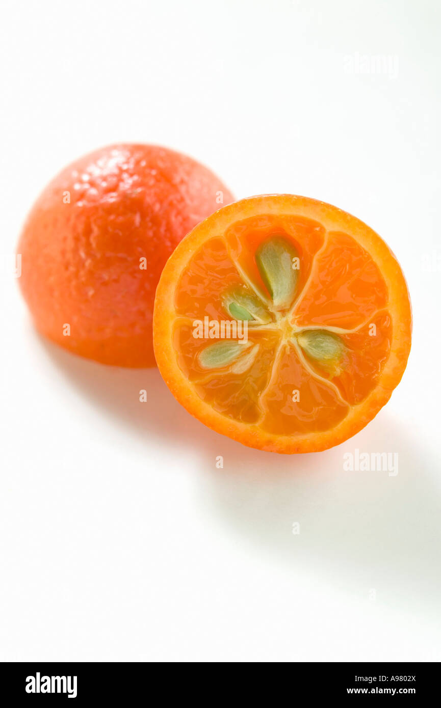 Small orange halved with pips FoodCollection Stock Photo - Alamy