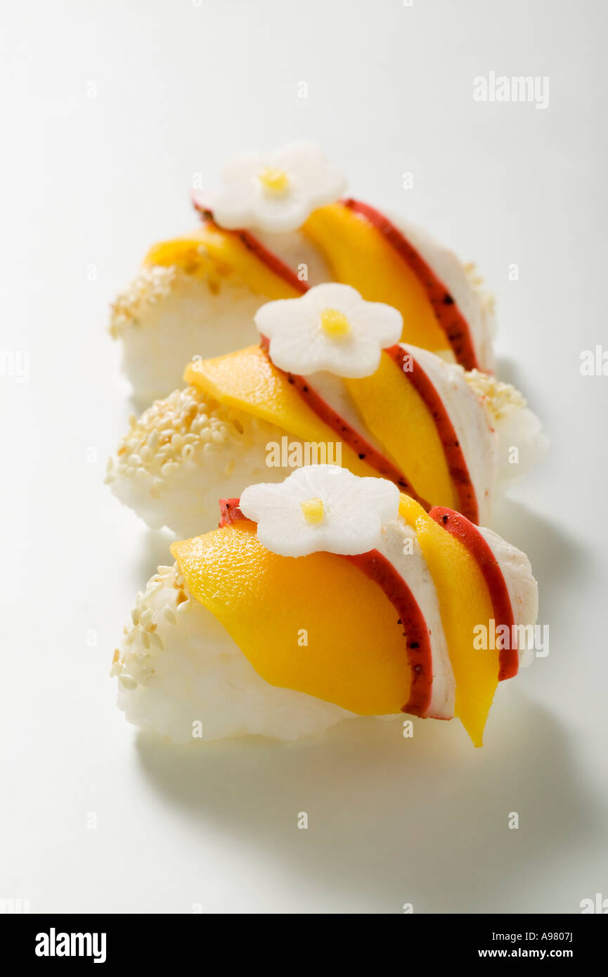 Nigiri sushi with chicken and mango FoodCollection Stock Photo - Alamy
