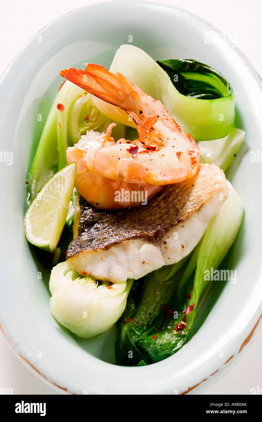 Shrimps and fish with pak choi FoodCollection Stock Photo - Alamy