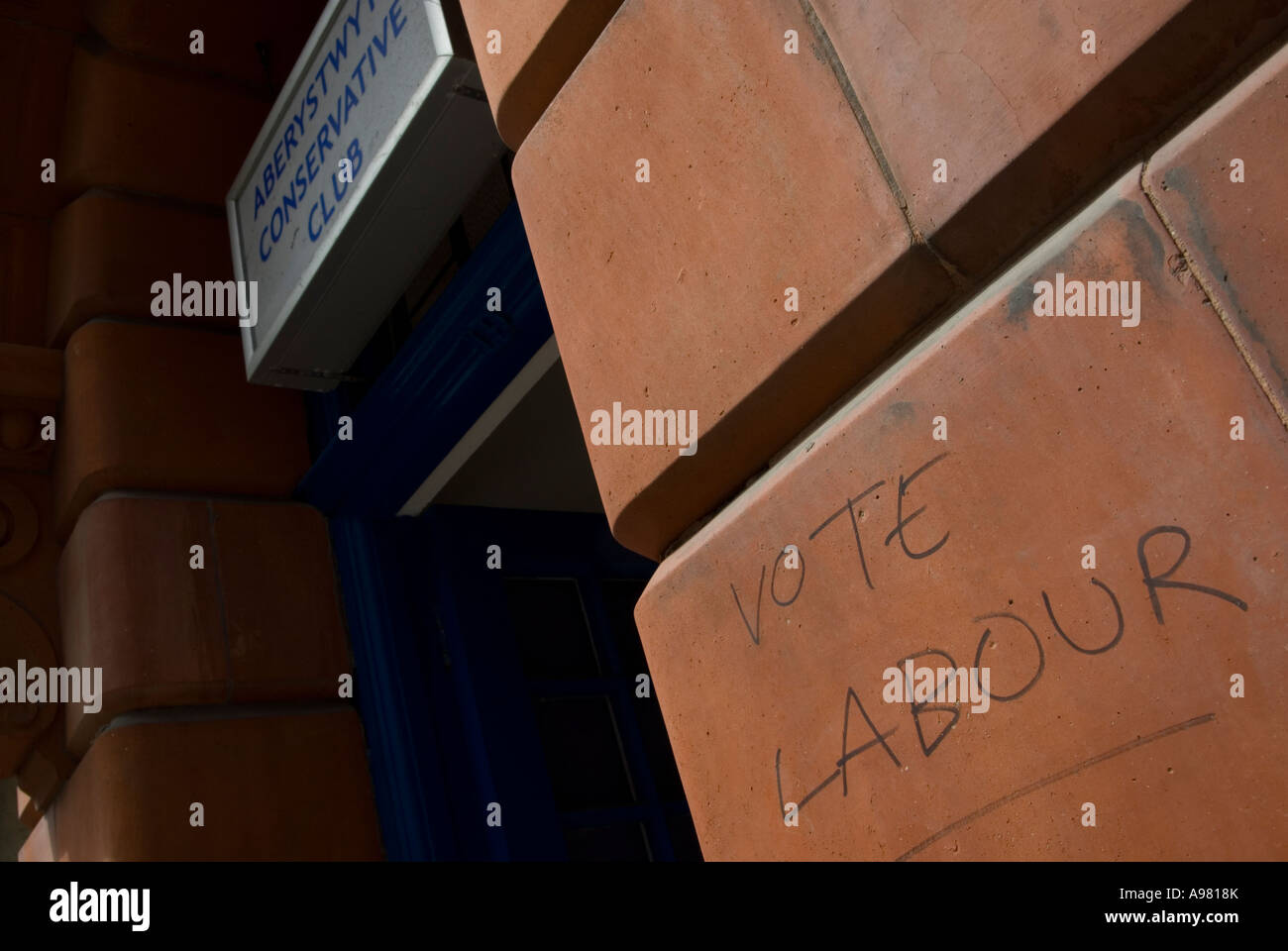 "Vote Labour" graffiti at doorway of Aberystwyth Conservative club ...