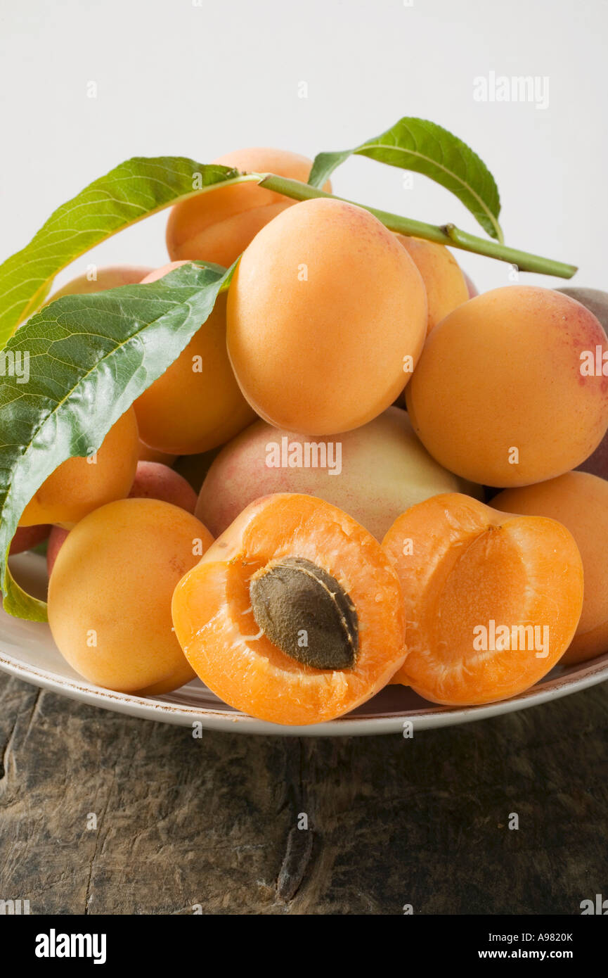 Apricots and peaches in a bowl FoodCollection Stock Photo - Alamy