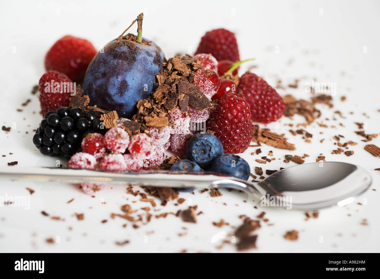 Mixed berries with chocolate shavings FoodCollection Stock Photo - Alamy