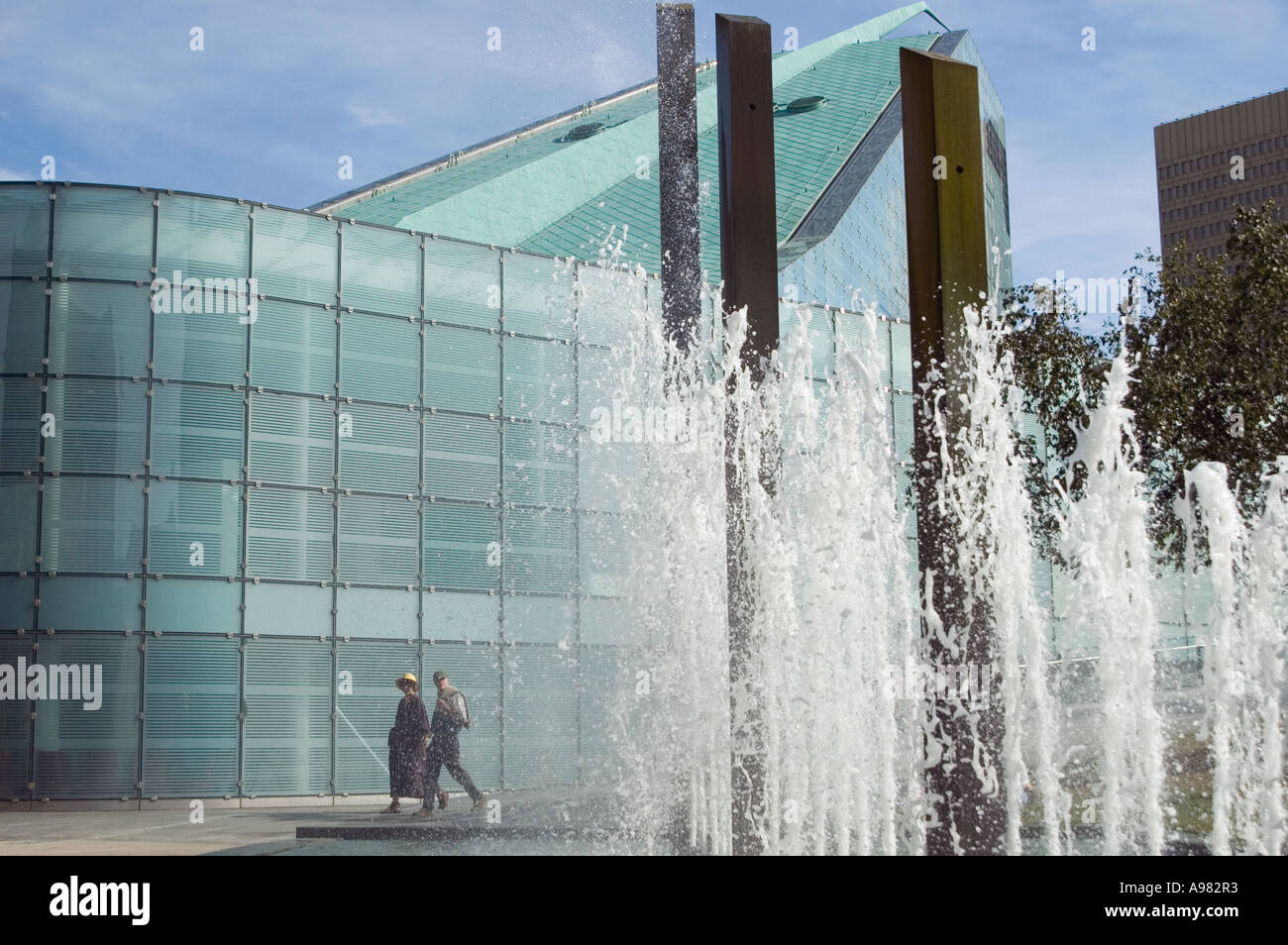 Man walking past fountain hi-res stock photography and images - Alamy