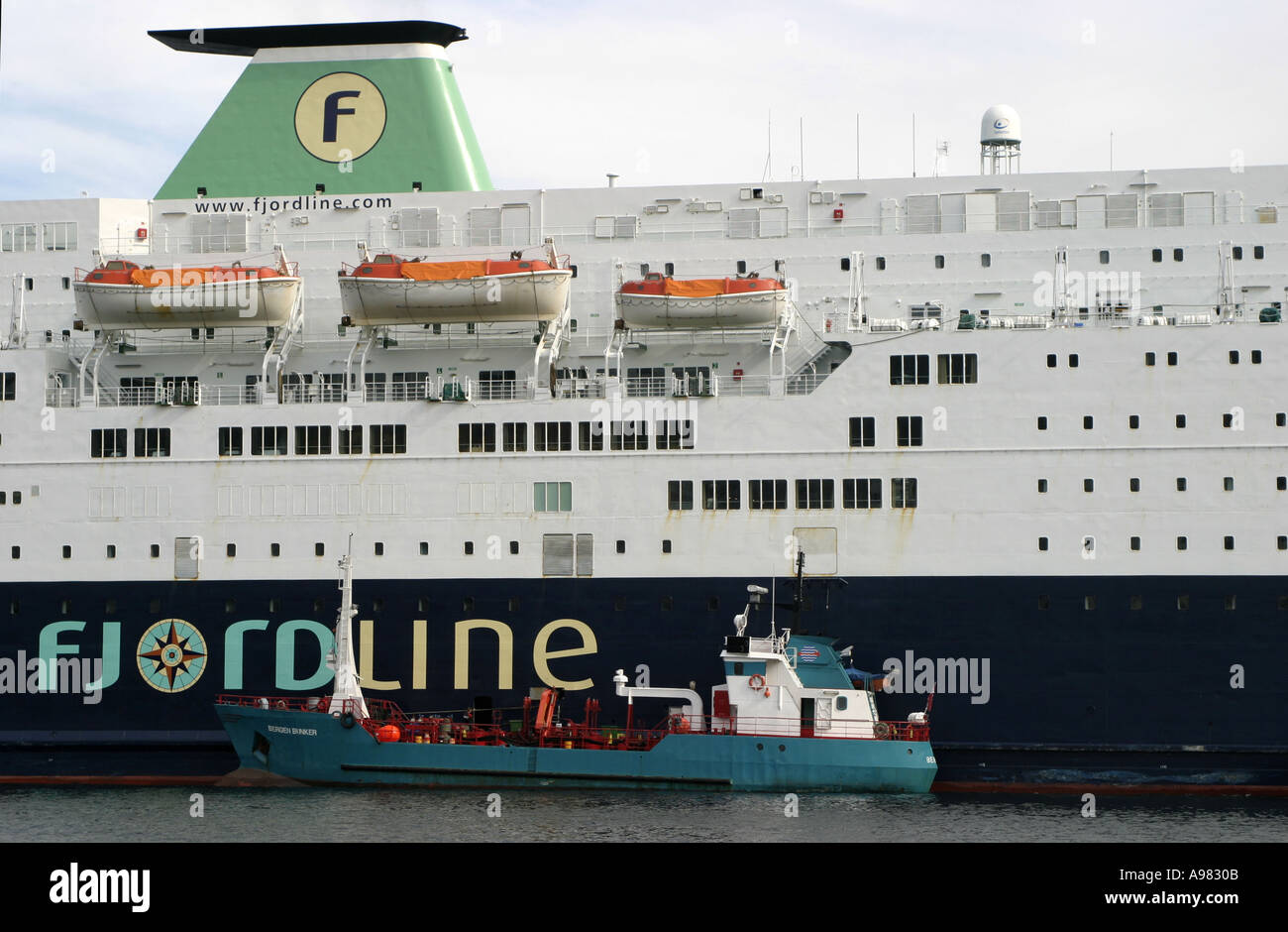 Mini tanker and ferry Stock Photo - Alamy