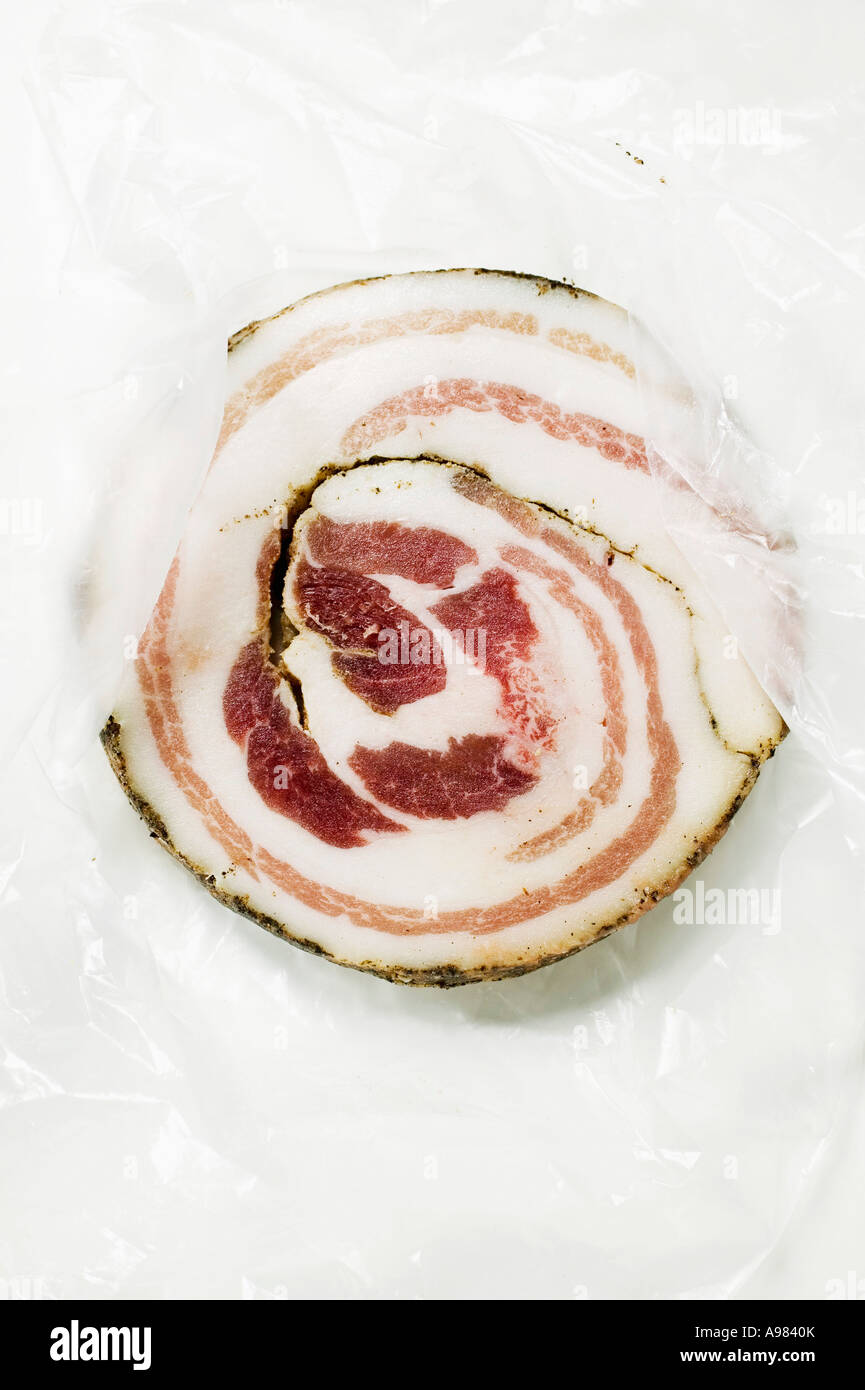 A slice of pancetta on plastic food wrap FoodCollection Stock Photo - Alamy