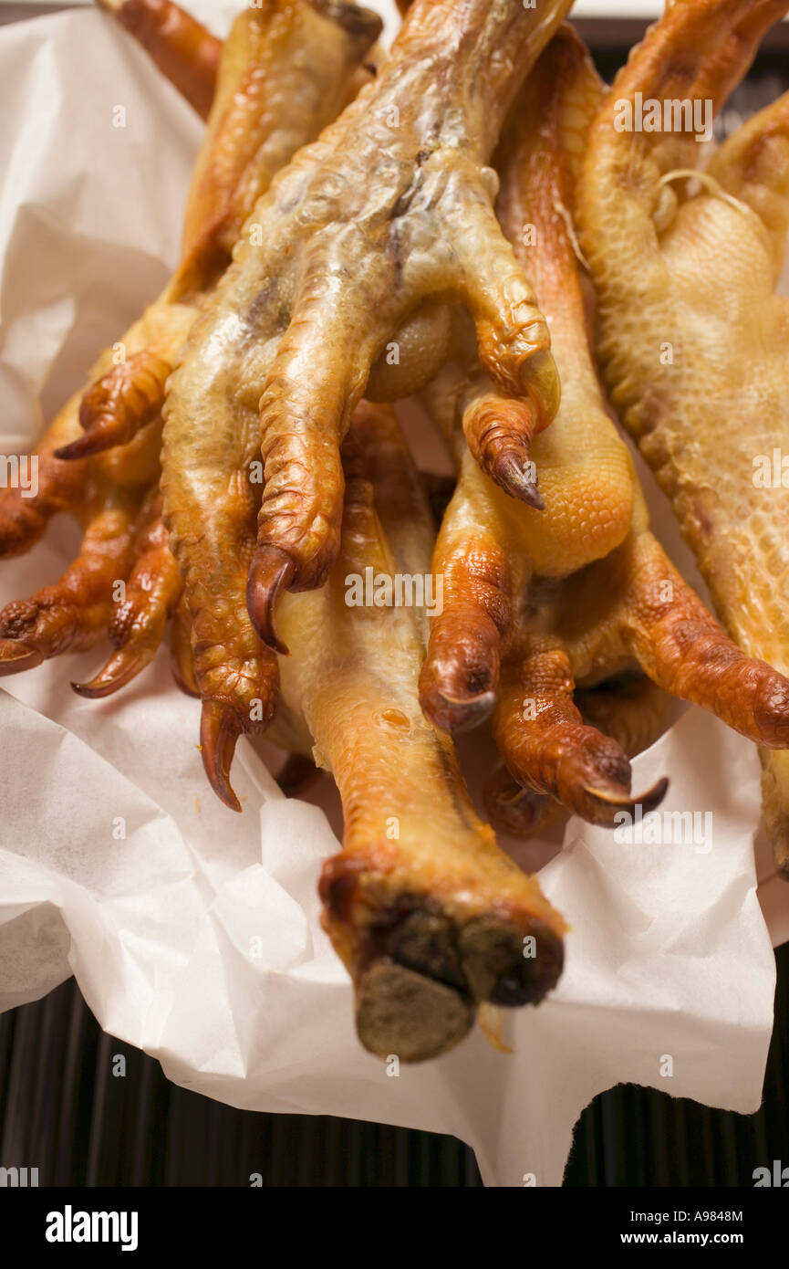 Deep fried chicken feet on paper Asia FoodCollection Stock Photo - Alamy