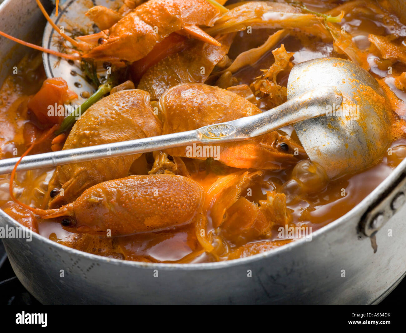 Crayfish stew in stew pan on cooker FoodCollection Stock Photo - Alamy