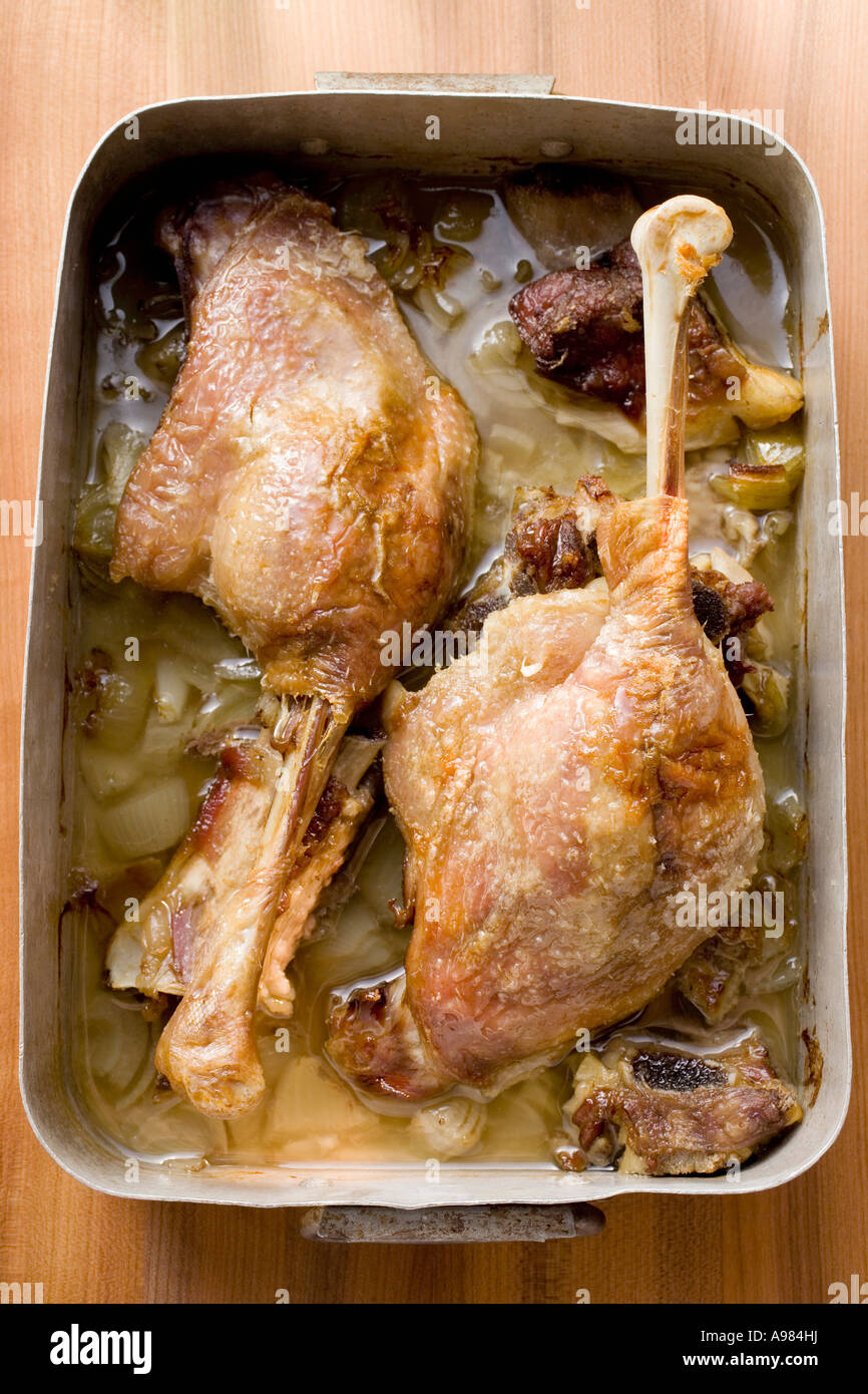 Roast goose legs in roasting tin FoodCollection Stock Photo - Alamy