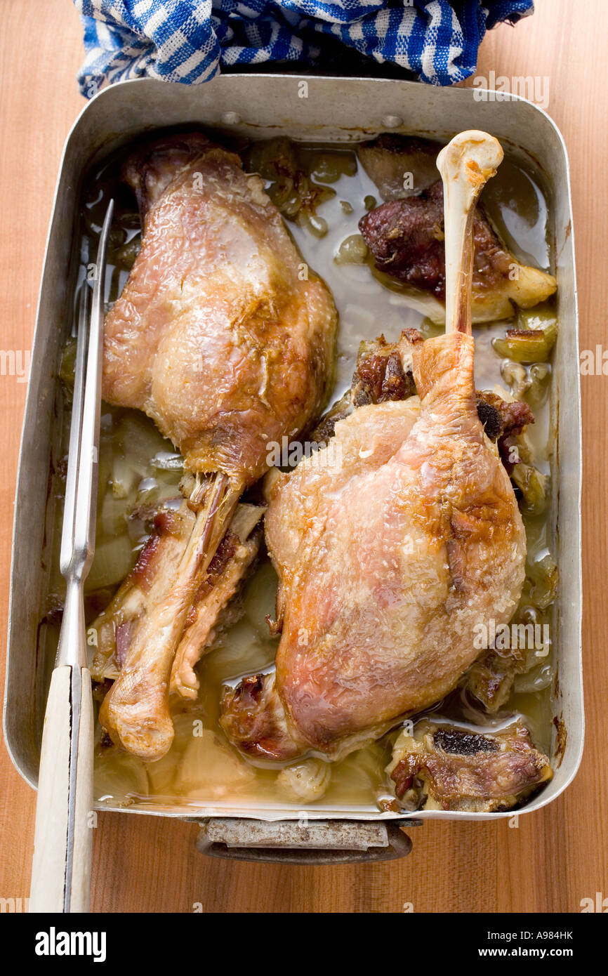 Roast goose legs in roasting tin FoodCollection Stock Photo - Alamy