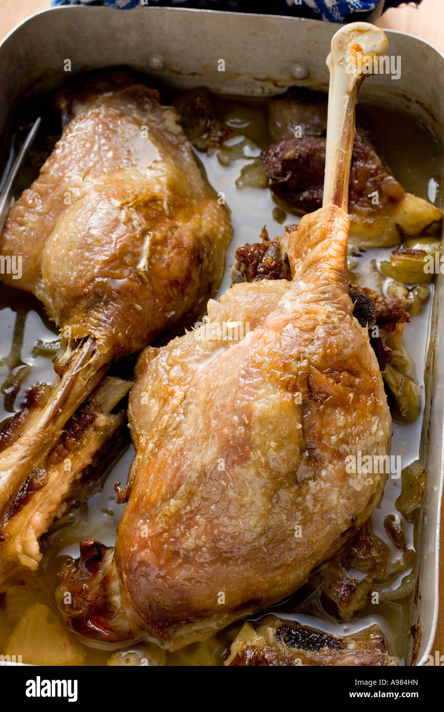 Roast goose legs in roasting tin FoodCollection Stock Photo - Alamy