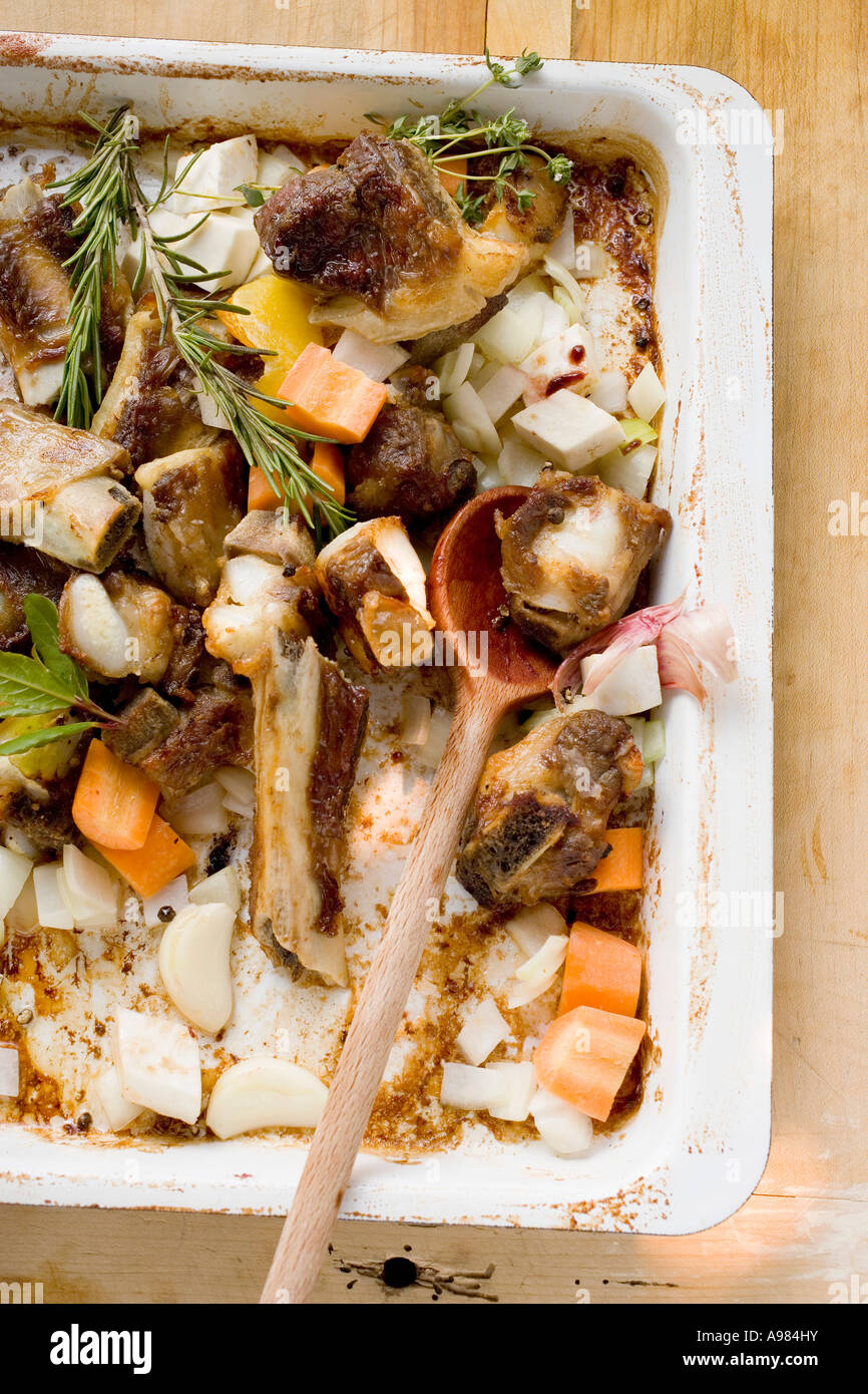 Roasted veal bones and vegetables making veal stock FoodCollection ...