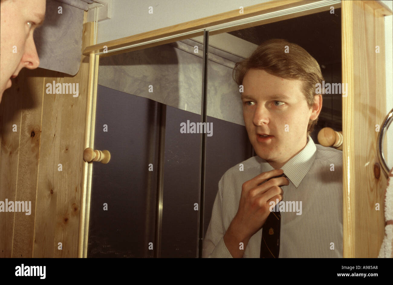 Office worker preparing himself before commuting to work Stock Photo ...