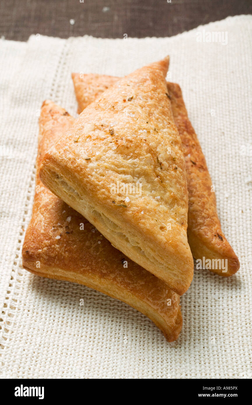 Triangular savoury puff pastry pasties FoodCollection Stock Photo - Alamy