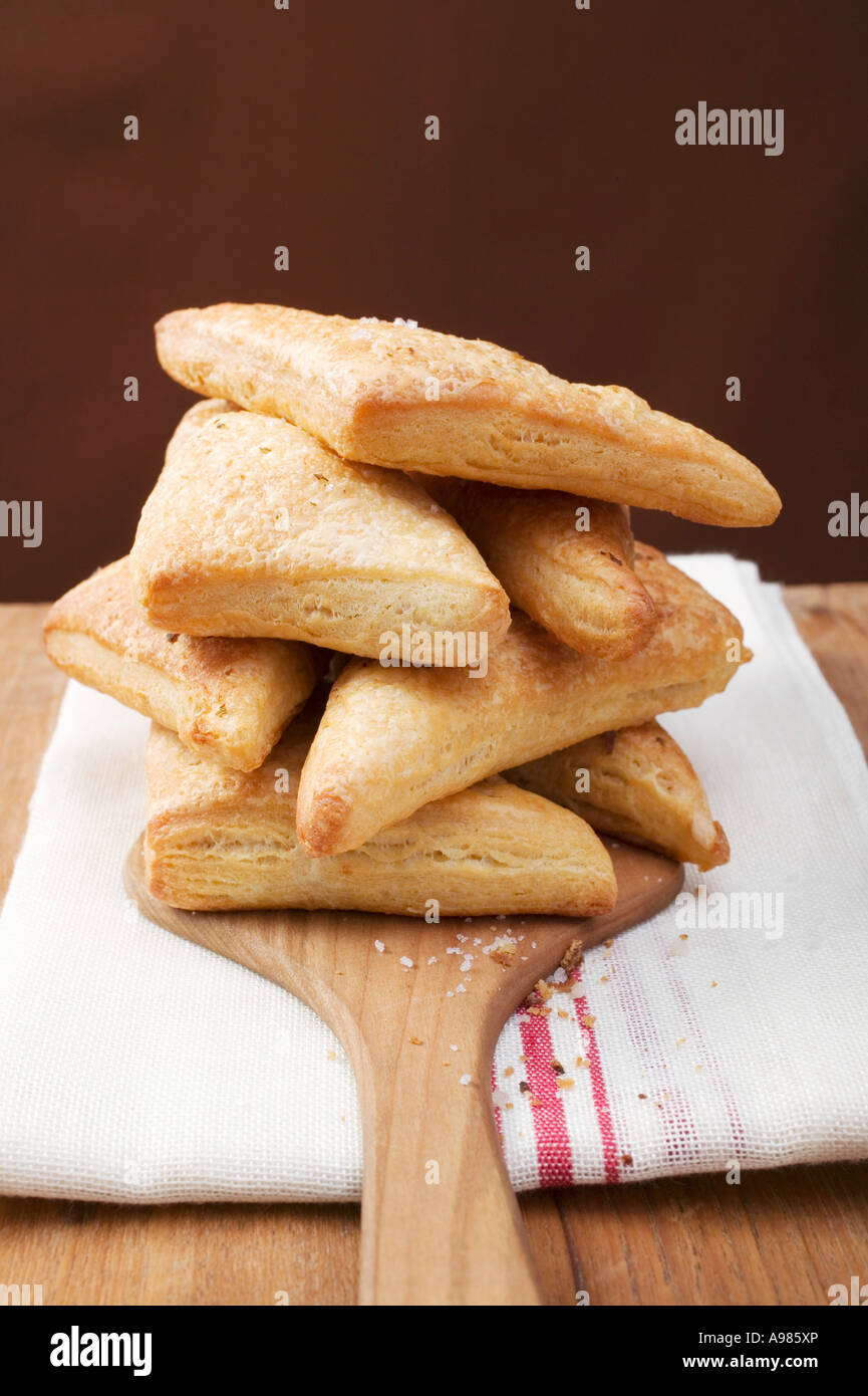 Triangular savoury puff pastry pasties in a pile FoodCollection Stock ...