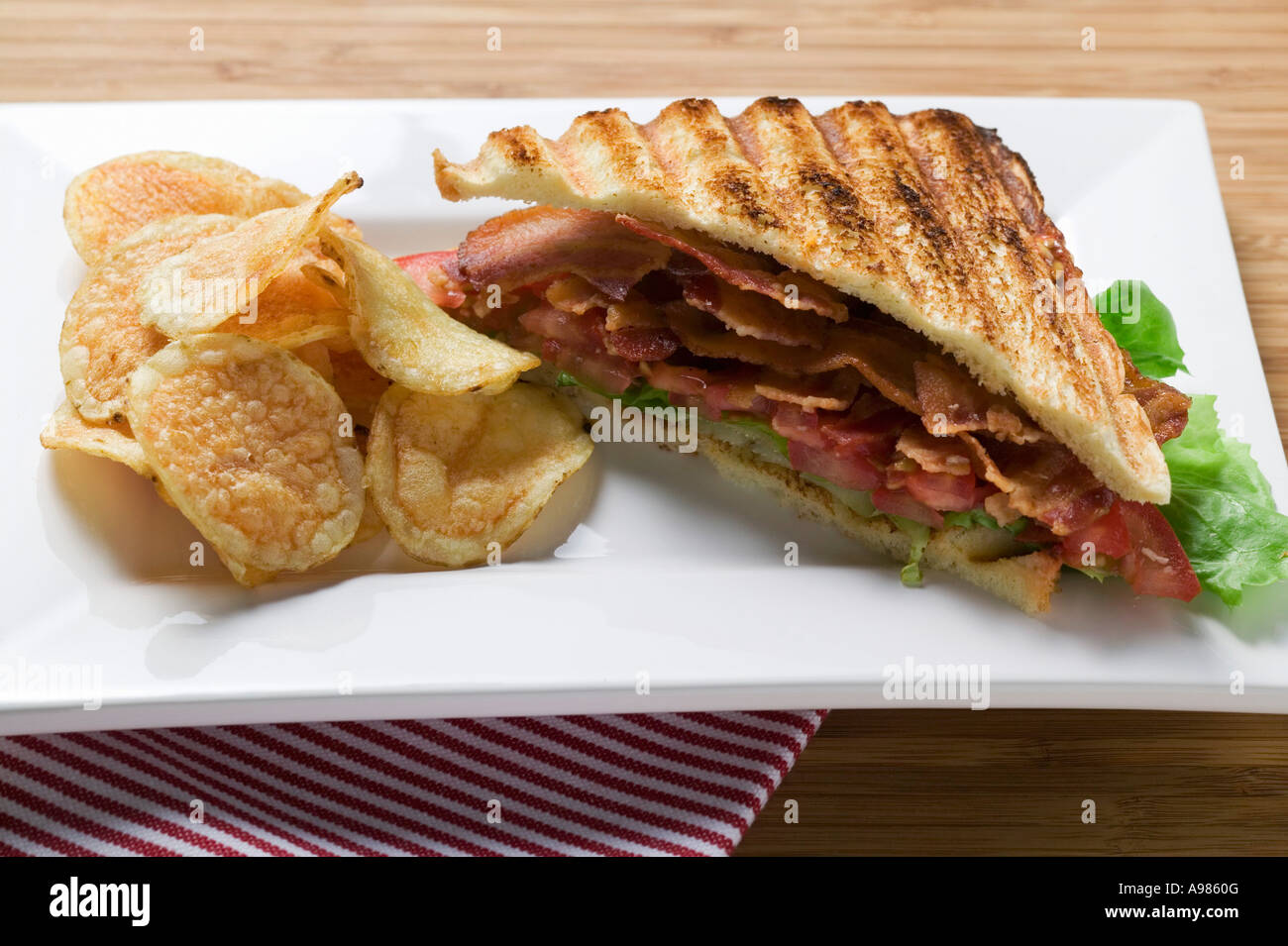 BLT sandwich toasted with crisps FoodCollection Stock Photo - Alamy