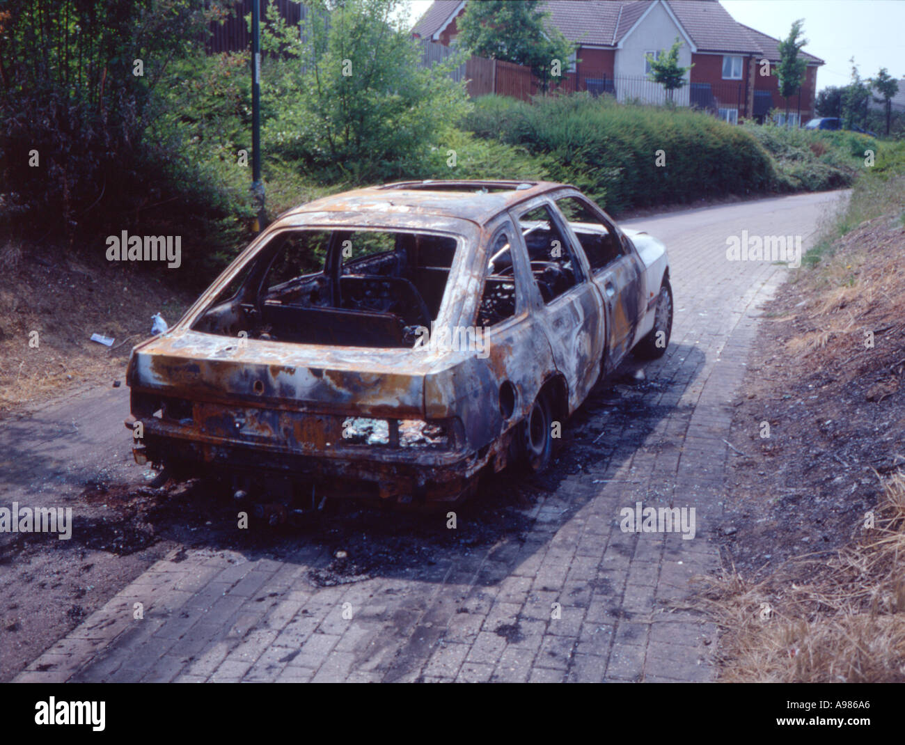 burnt out vandalised car Stock Photo - Alamy