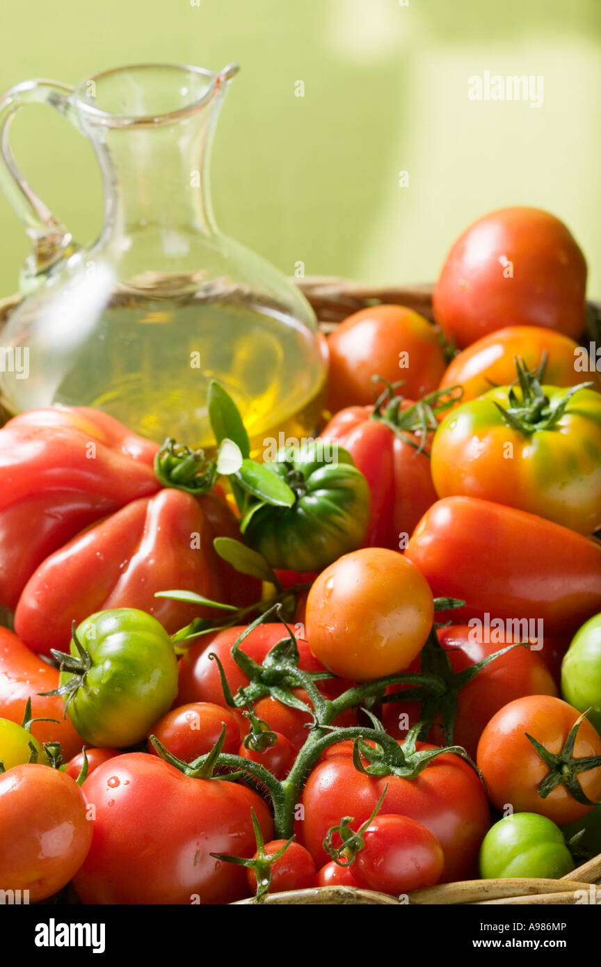 Assorted tomatoes and olive oil FoodCollection Stock Photo - Alamy
