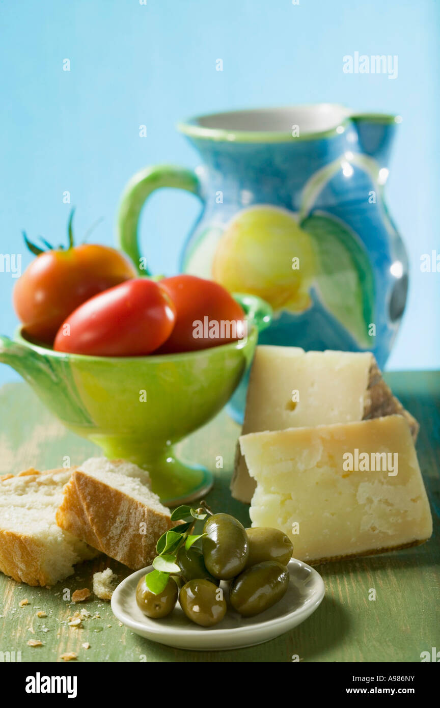 Still life with olives tomatoes cheese and white bread FoodCollection ...