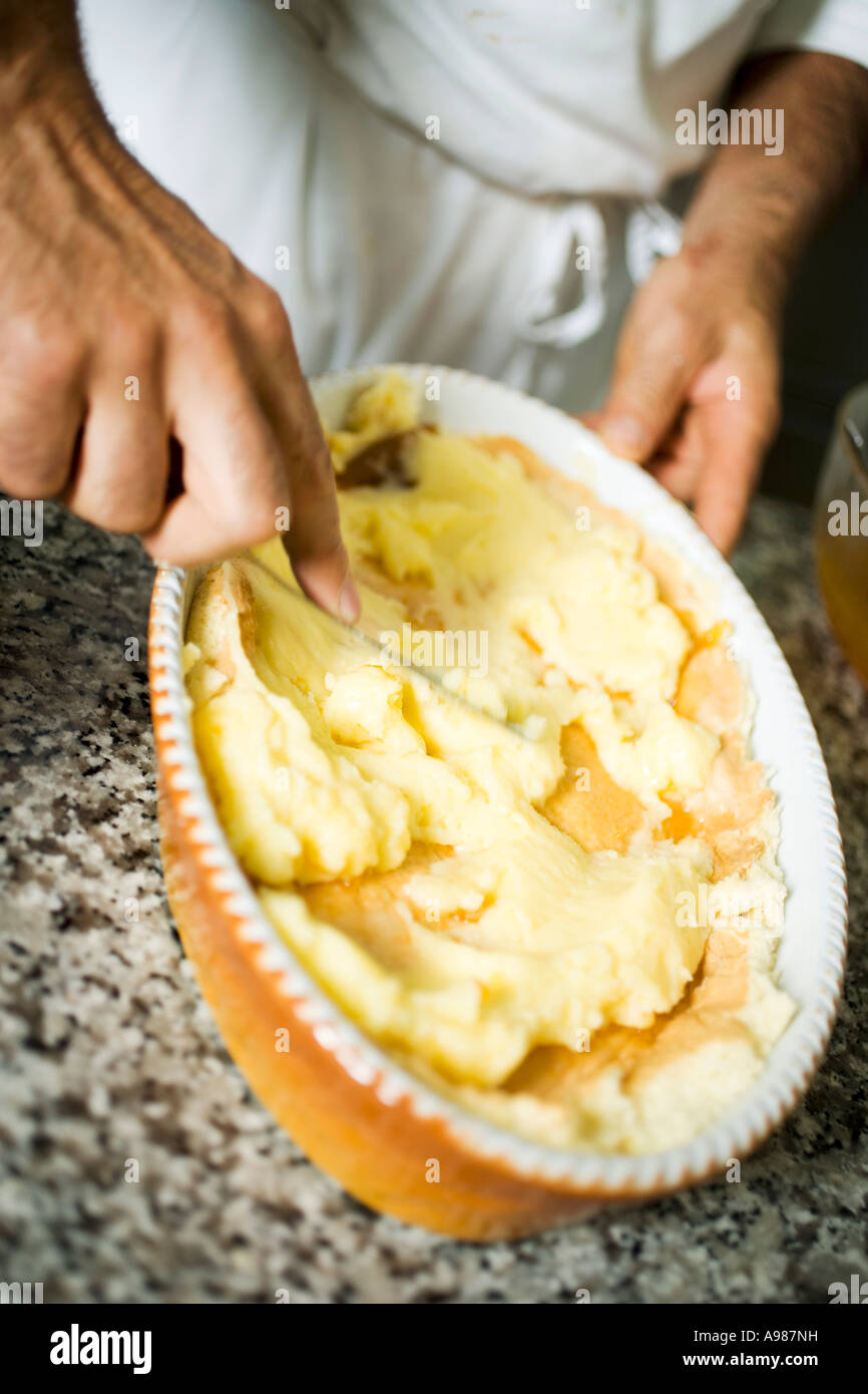 Spreading cream mixture on sponge FoodCollection Stock Photo - Alamy
