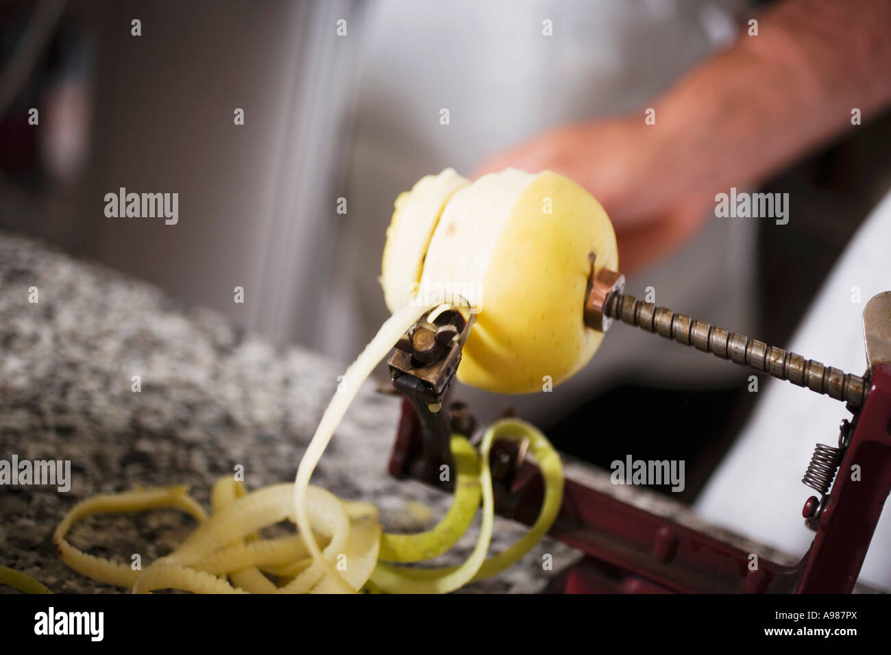 Peeling an apple and cutting into a spiral FoodCollection Stock Photo ...