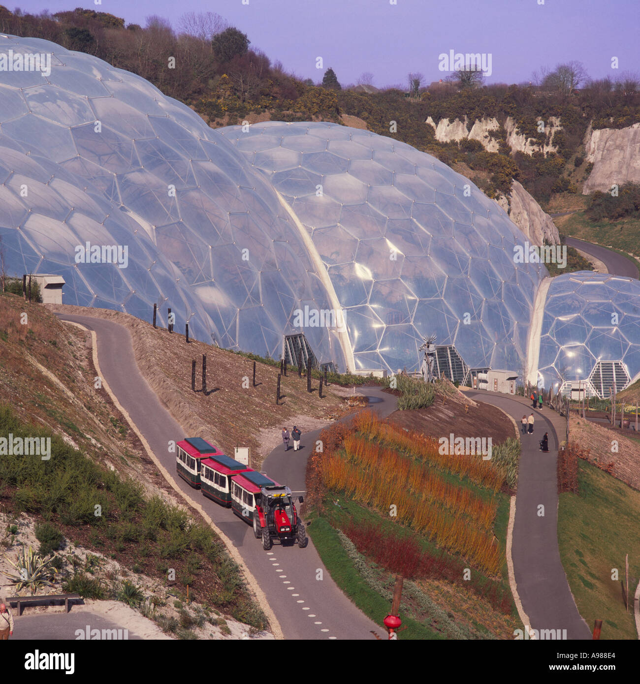 Landscape view of people walking and close up of Humid Tropics Biome ...