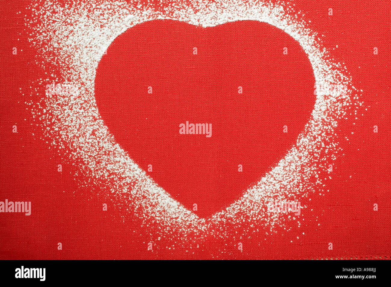 Red heart shape outlined in icing sugar FoodCollection Stock Photo - Alamy