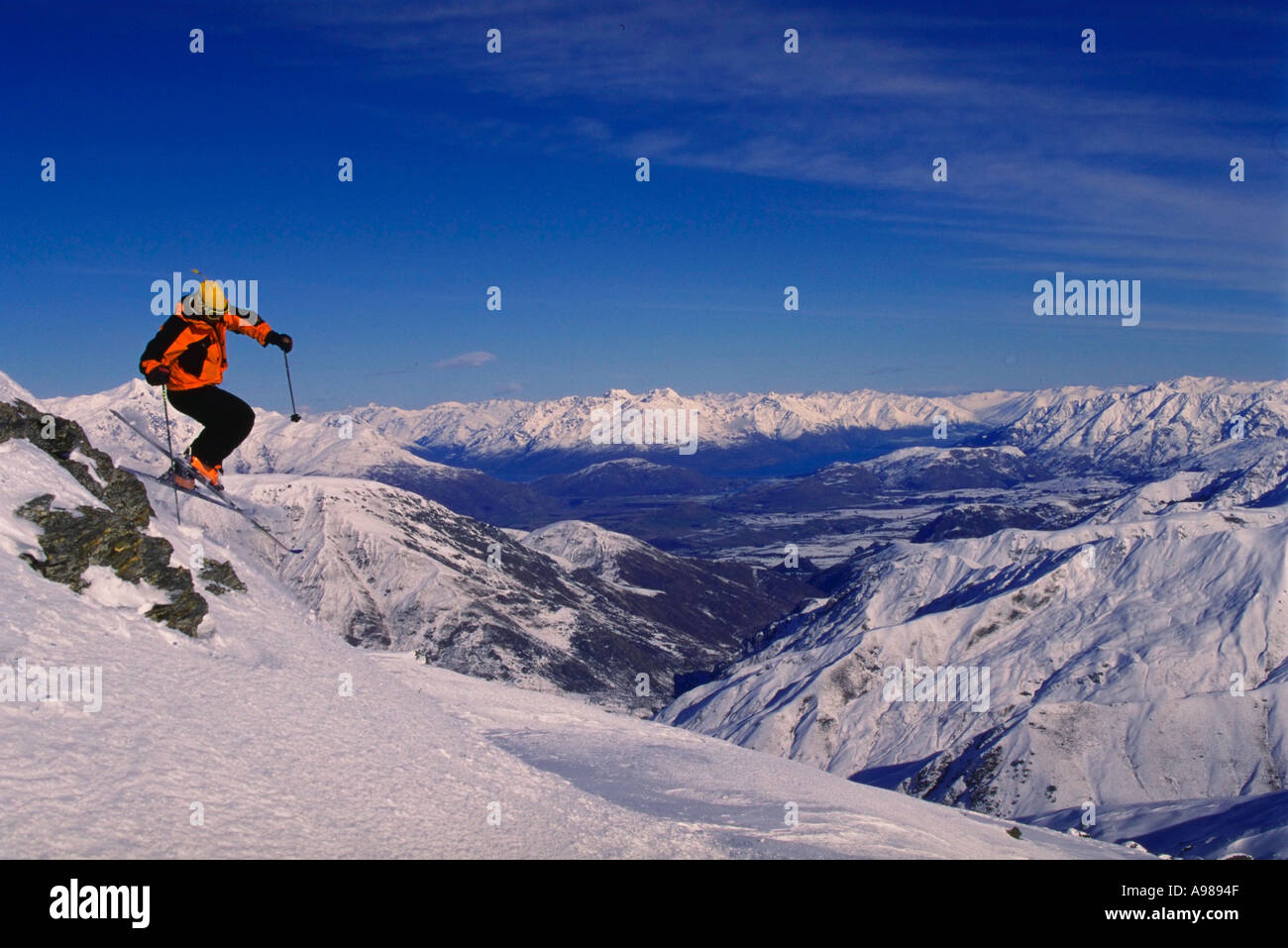 Skier backside of Cardrona Ski Field Harris Mountains New Zealand Stock ...