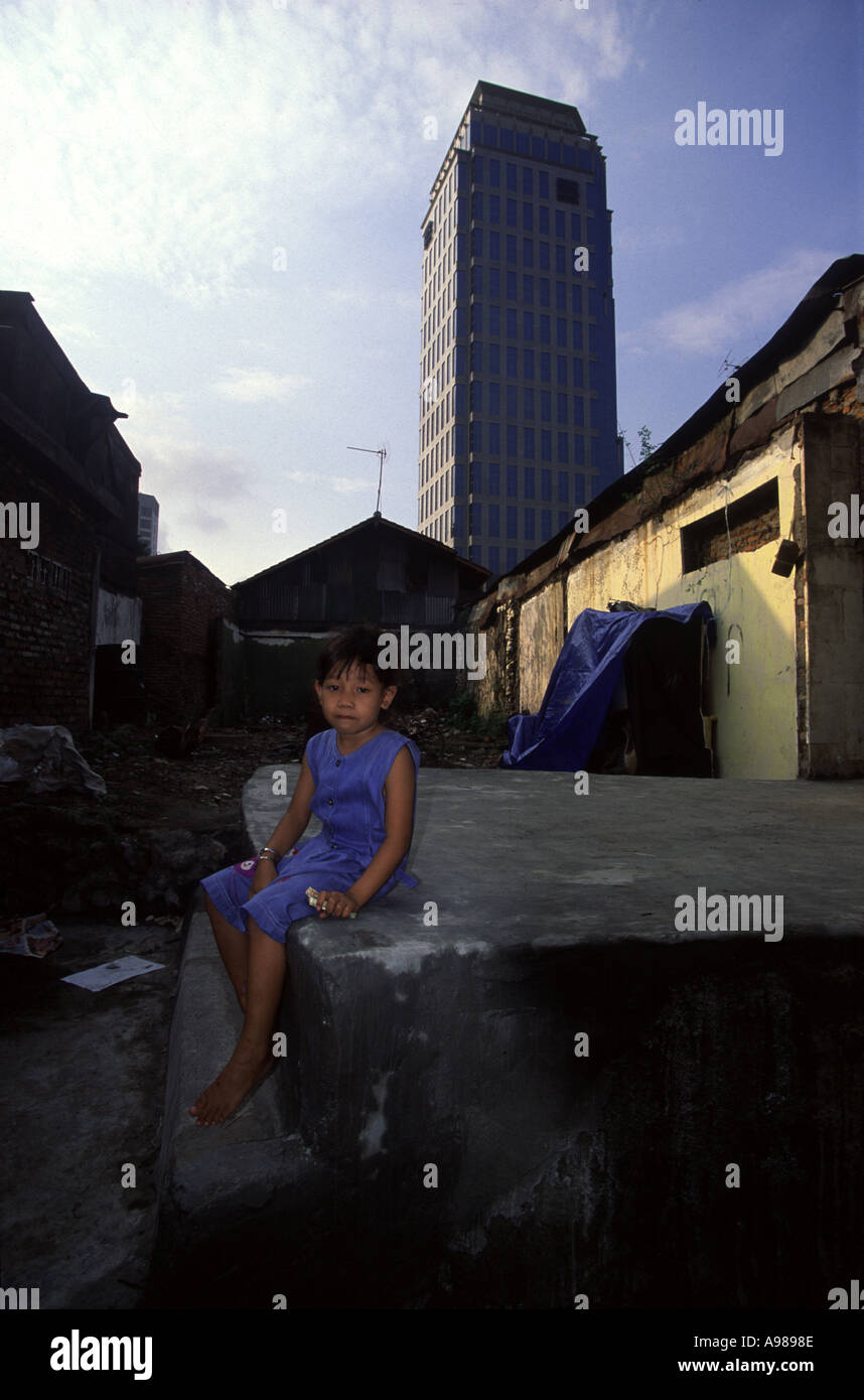 Poor girl crying in front of building Stock Photo - Alamy