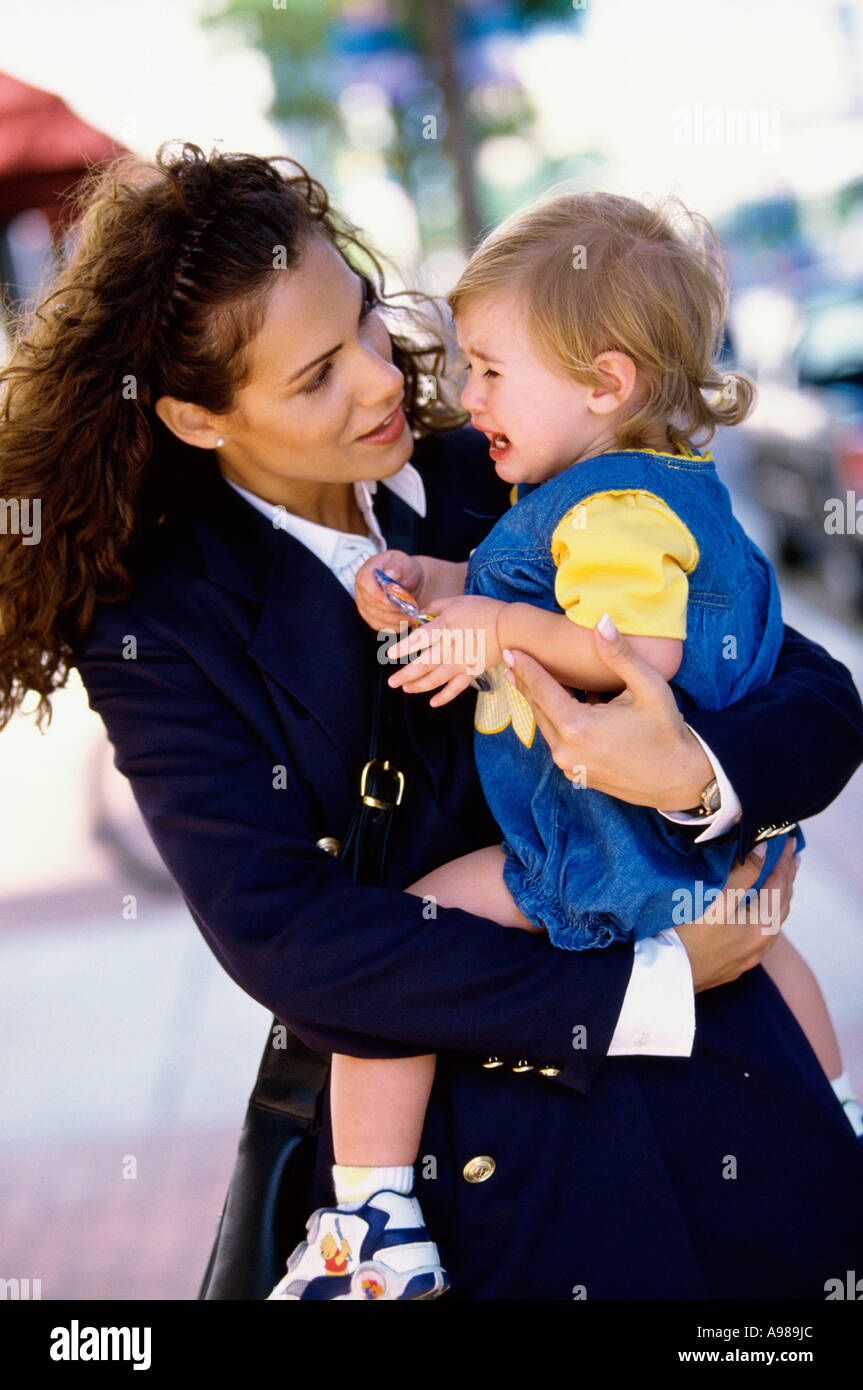 Close-up of a mother consoling her baby Stock Photo - Alamy