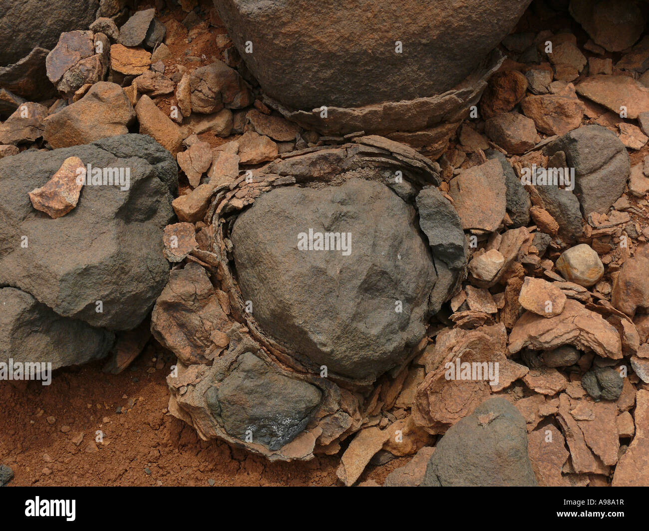 Layers of Stones separating because of rain, its natural process of ...