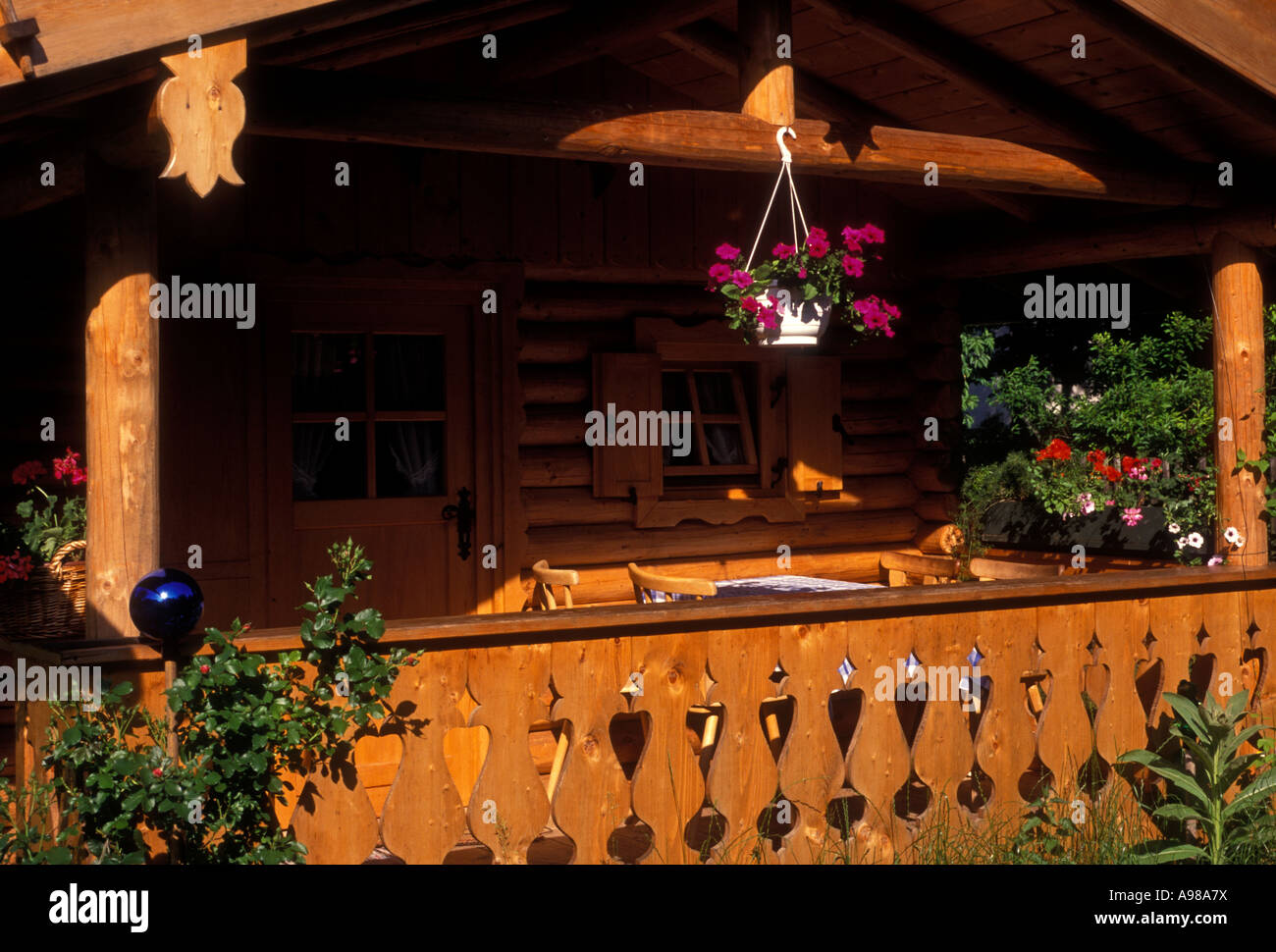 Front porch of wooden house town of Garmisch-Partenkirchen Bavaria ...