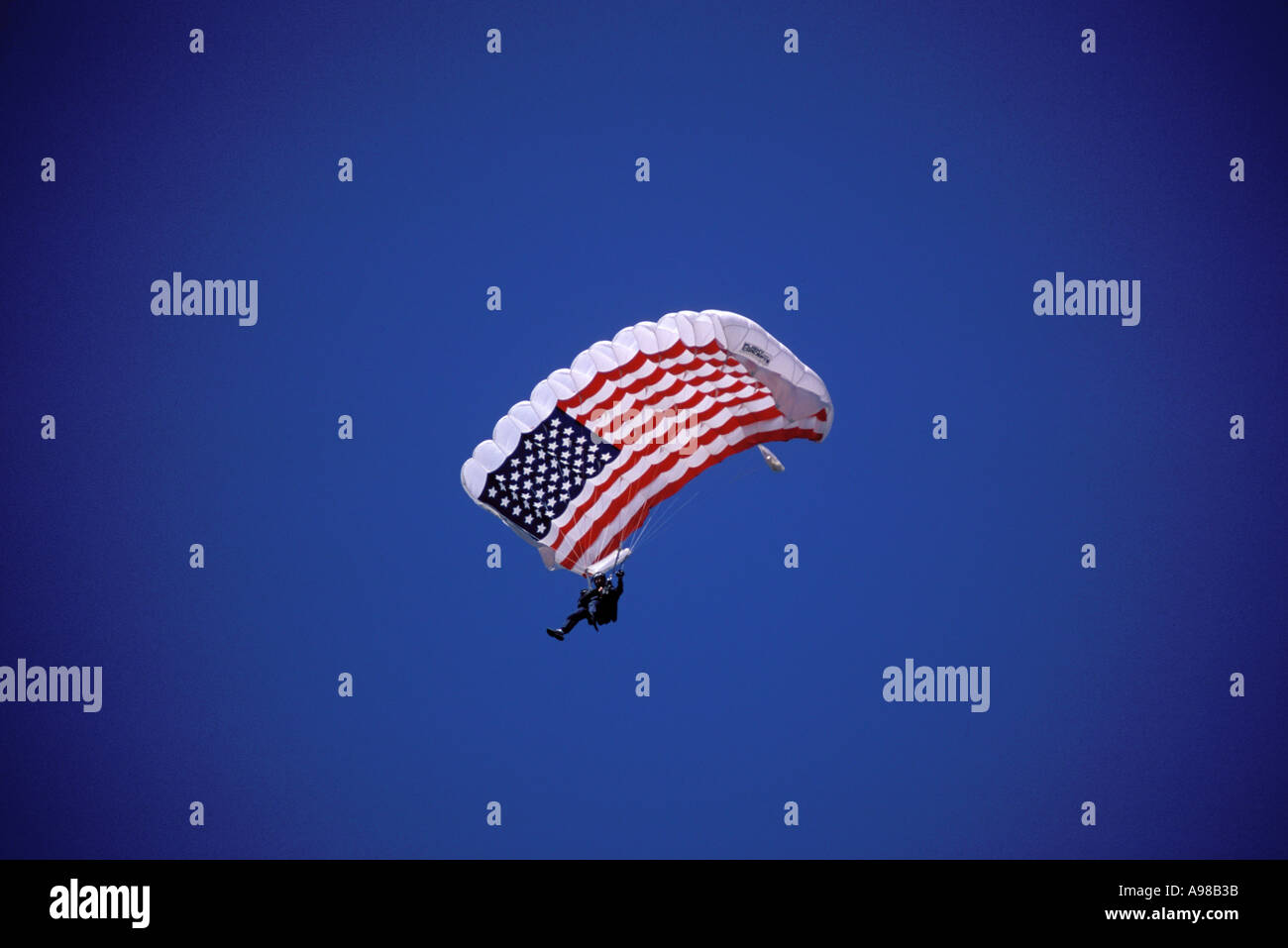Flag, US flag parachute jumper Stock Photo - Alamy