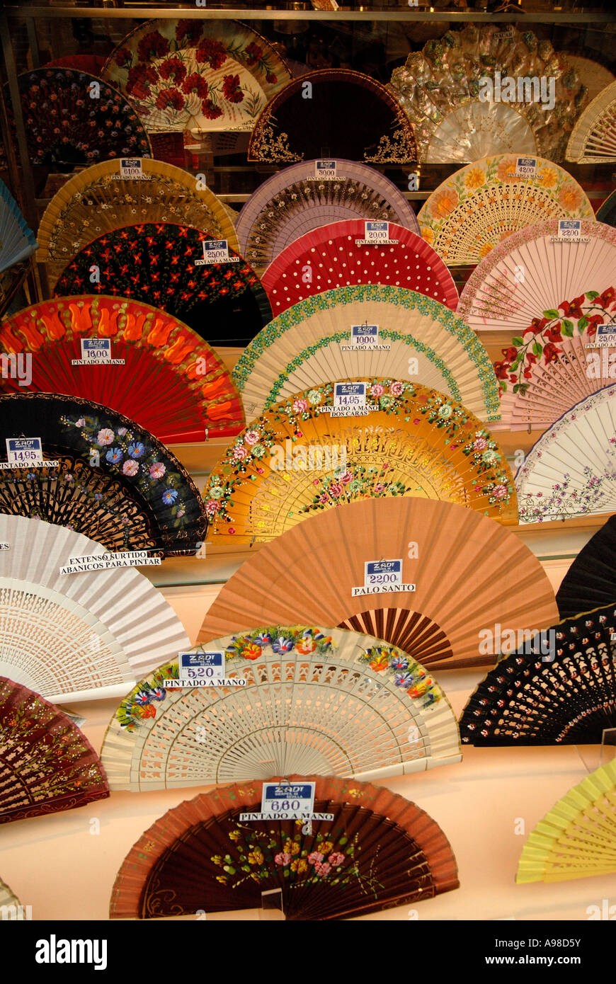 Traditional fans in shop window, Seville Stock Photo - Alamy