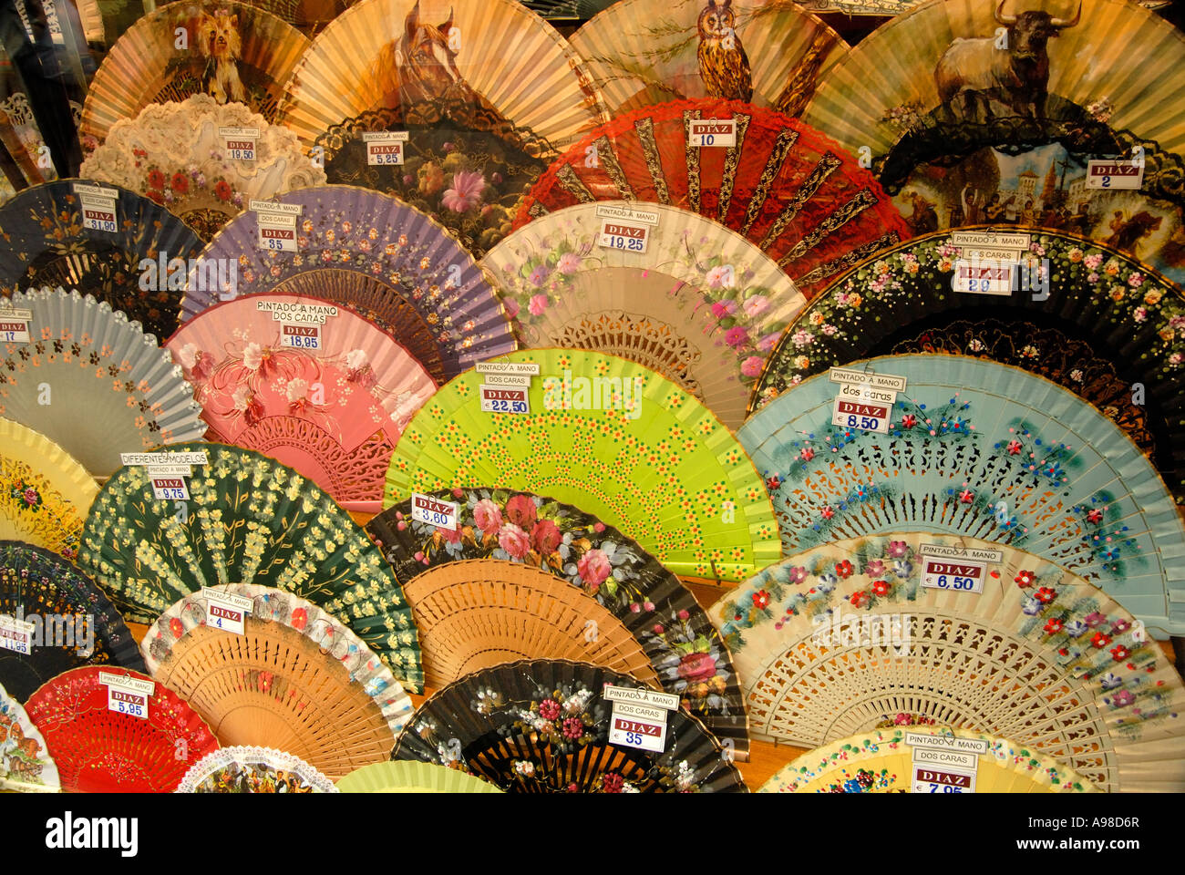Traditional fans in shop window, Seville Stock Photo - Alamy