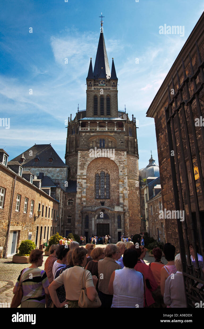 Aachen, Germany - Tourists with tour guide at Aachen Dom cathedral ...