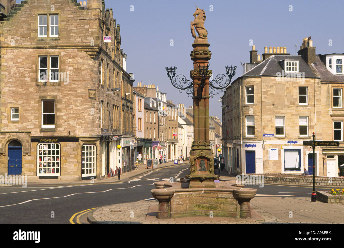 Shops and Market Cross in Jedburgh town centre on corner Exchange ...