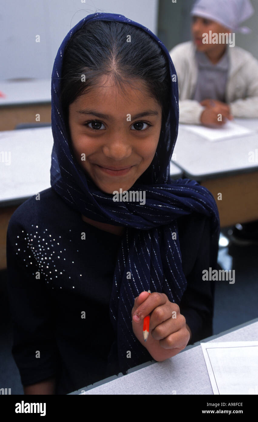 Young Sikh girl in Punjabi class, London, England Stock Photo - Alamy