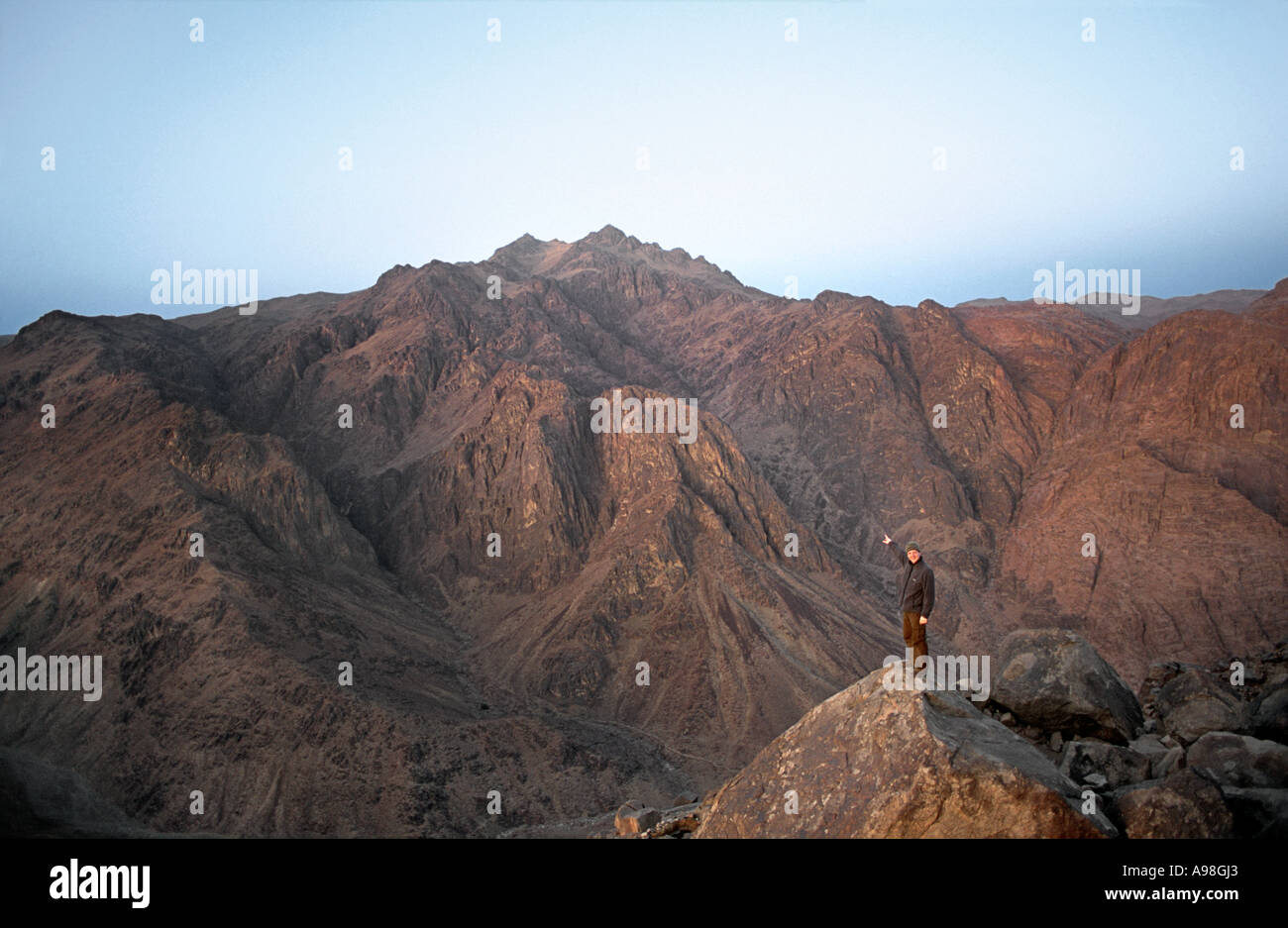 European hiker standing in front of Mount Catherine the highest ...
