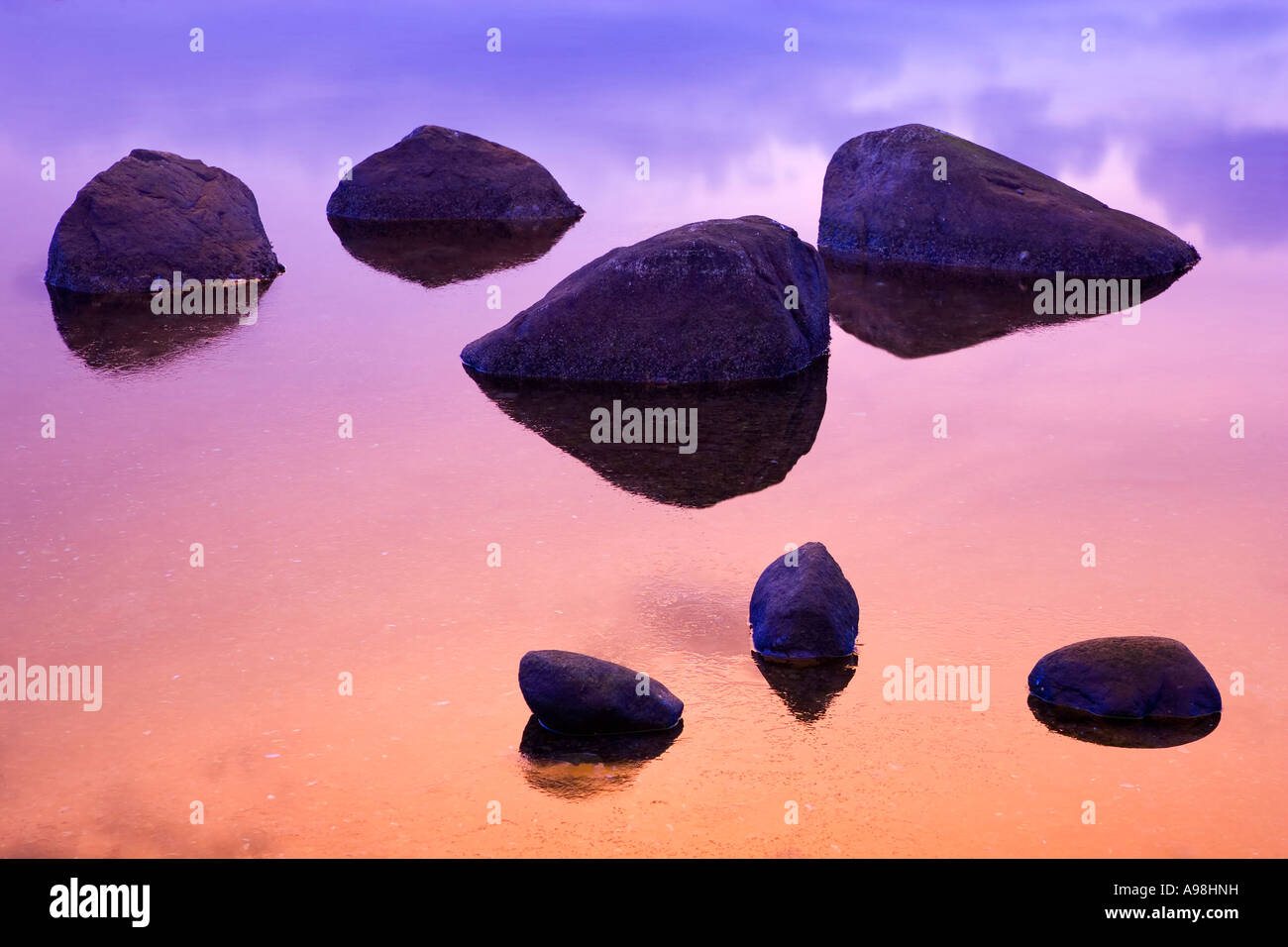 rocks in water Stock Photo - Alamy
