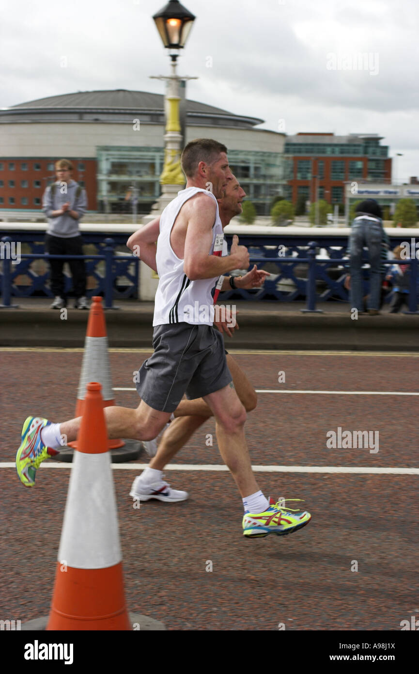 Two marathon runners in the Belfast Marathon 07 05 07 Stock Photo - Alamy