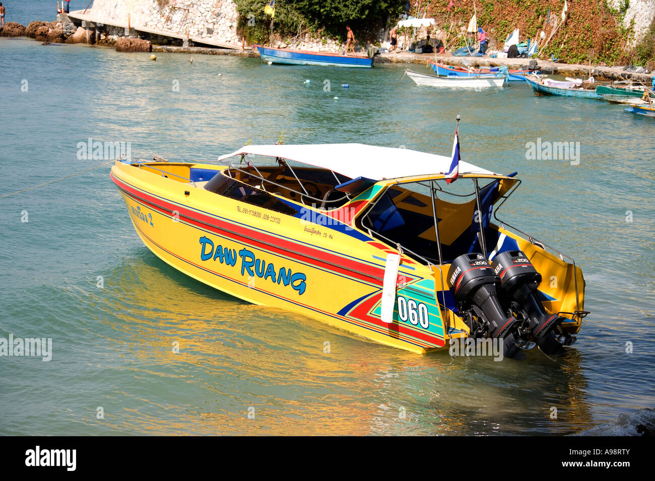 Yamaha yellow speedboat moored at the Dusit, Pattaya, Thailand Stock ...