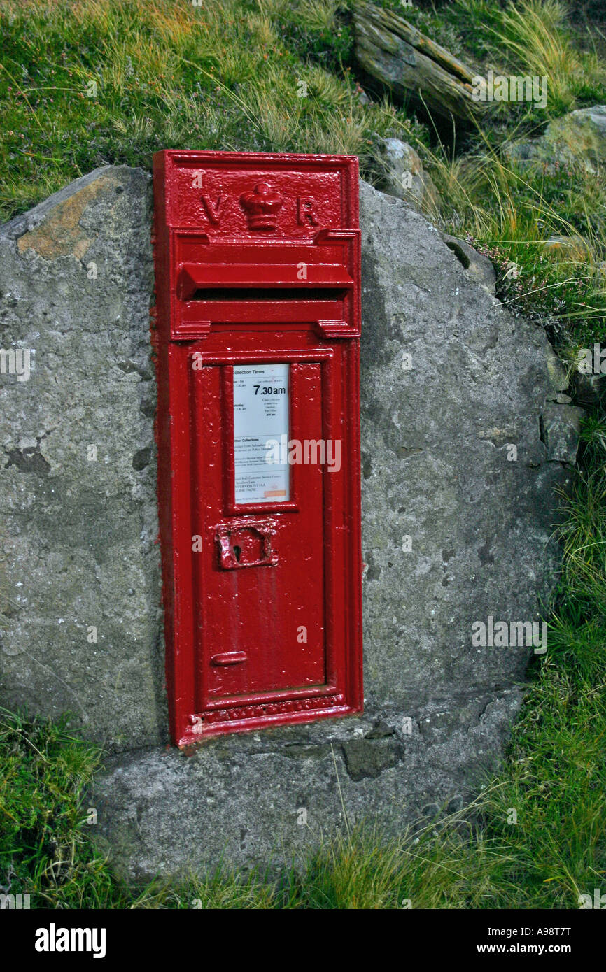 Red Victorian post box on rock at Scotland, England, UK Stock Photo - Alamy