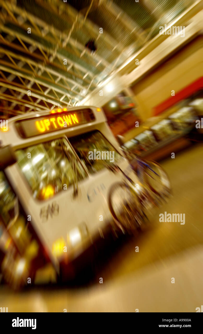 Vertical color image of a city bus on a city street at night Stock ...