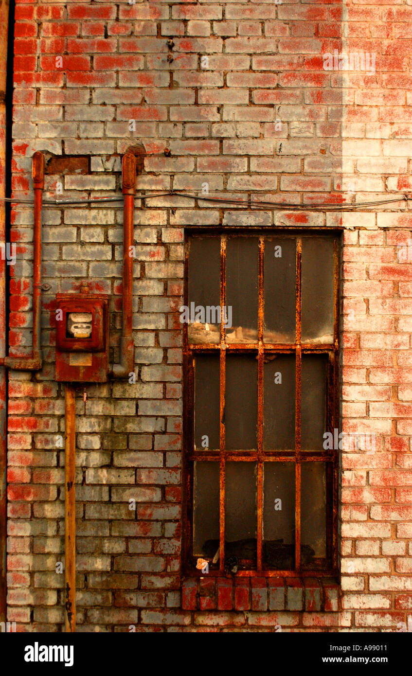 Electrical box on side of old abandoned brick building Stock Photo - Alamy