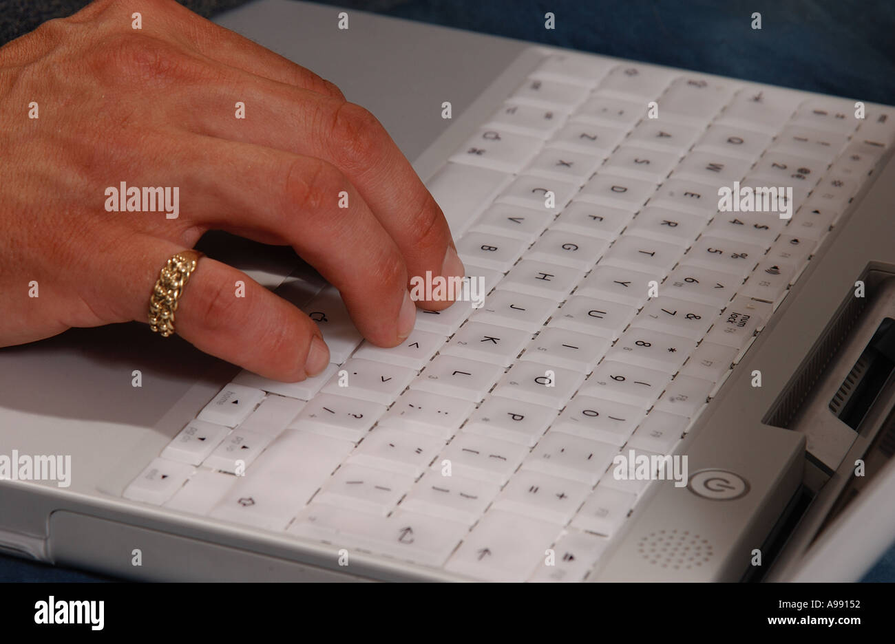 hands on laptop keyboard Stock Photo - Alamy