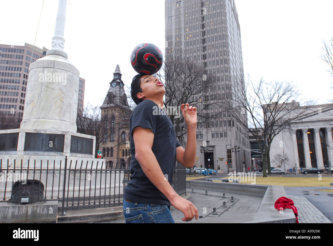A youth plays with a soccer ball in New Haven Connecticut USA Stock ...